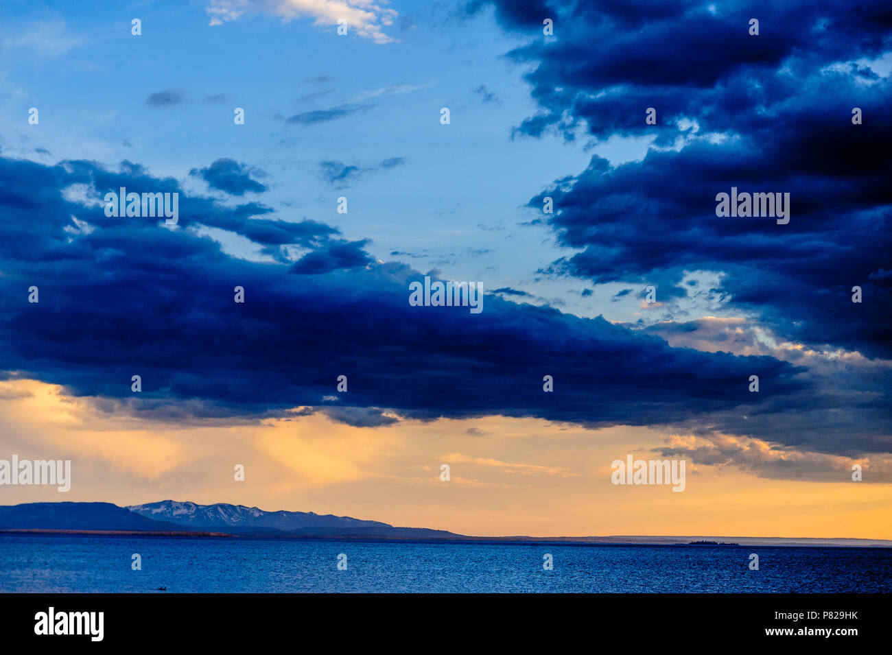 Sunset over lake Yellowstone Stock Photo - Alamy