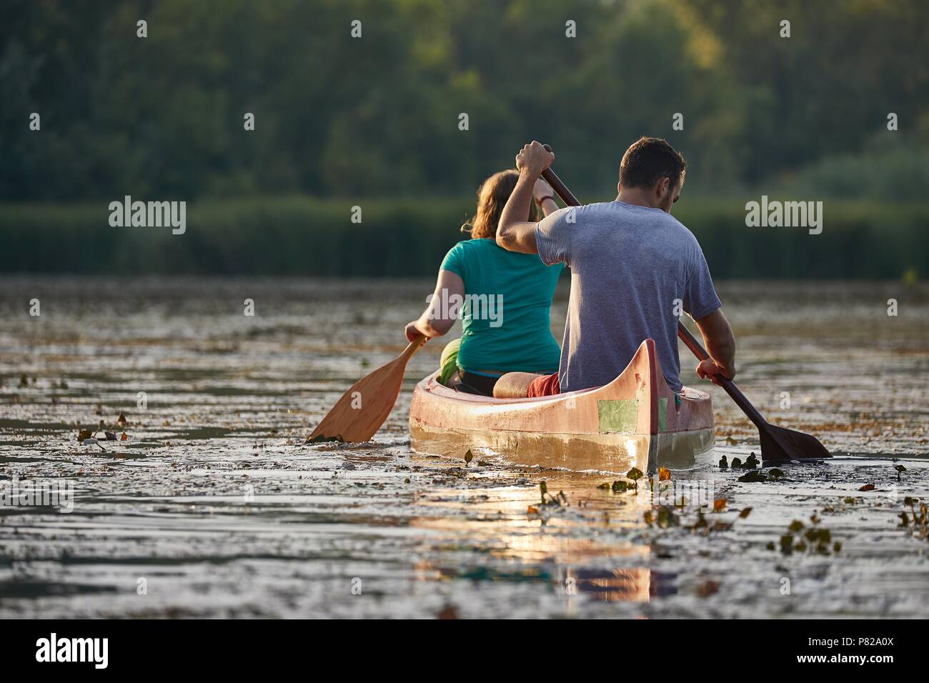 Couple enjoy canoeing woman hi-res stock photography and images - Alamy