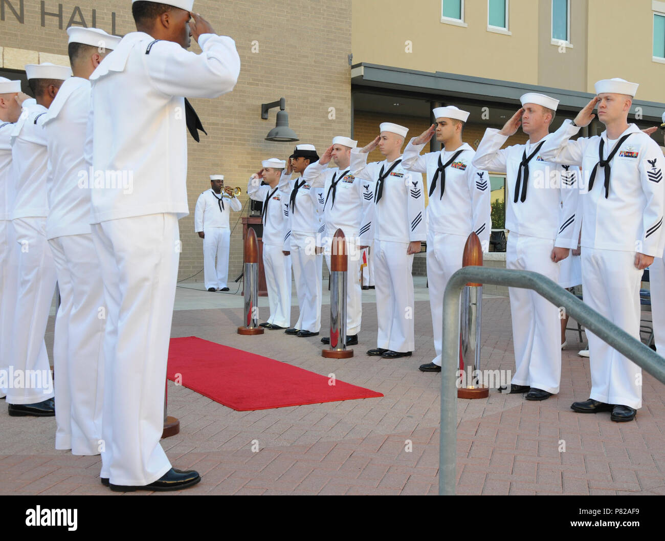 SAN ANTONIO (June 7, 2016) Side boys salute during the playing of Taps ...