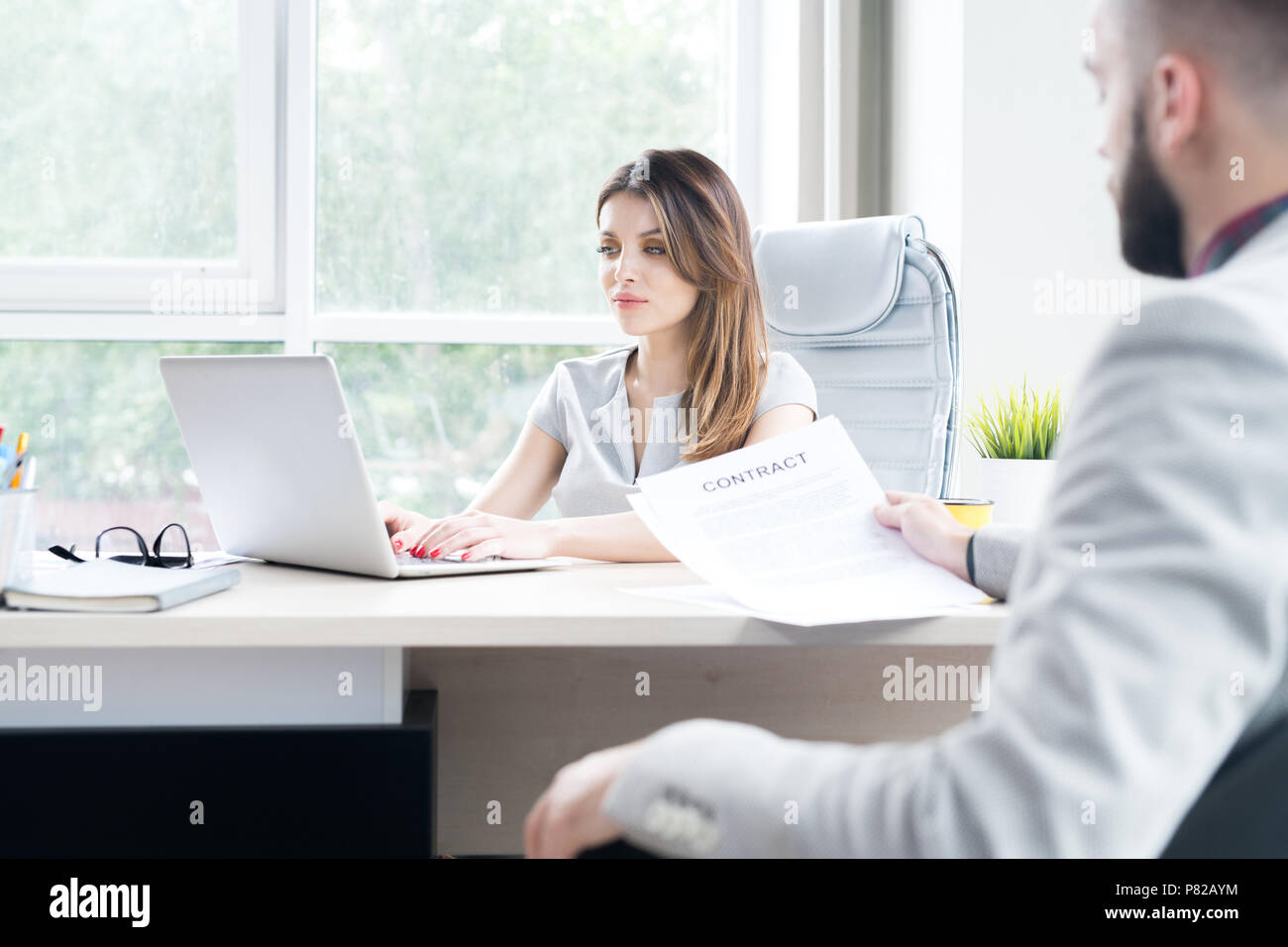 Female Manager in Office Stock Photo - Alamy