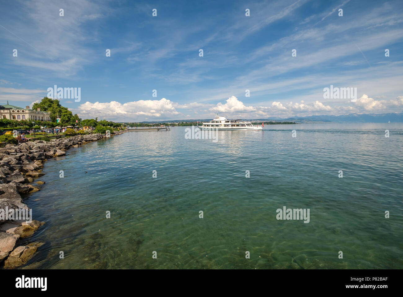 Passenger ferry boat arrives in the port of Morges, Switzerland. Ferry ...