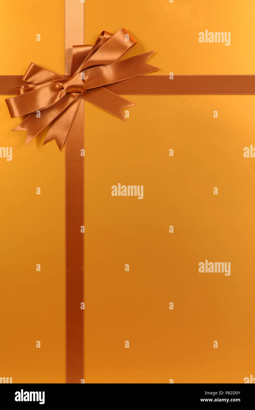 Gold gift background border ribbon and bow vertical Stock Photo - Alamy