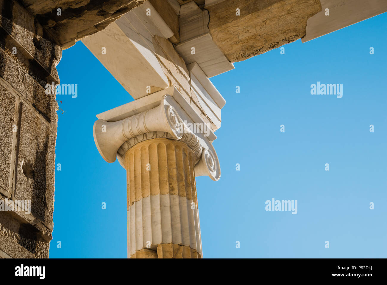 Close-up detail of reconstructed ancient Greek marble column, pillars ...