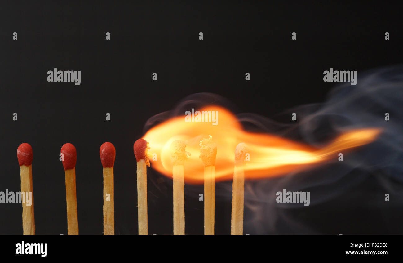 row of burning matches with smoke isolated on black background Stock ...