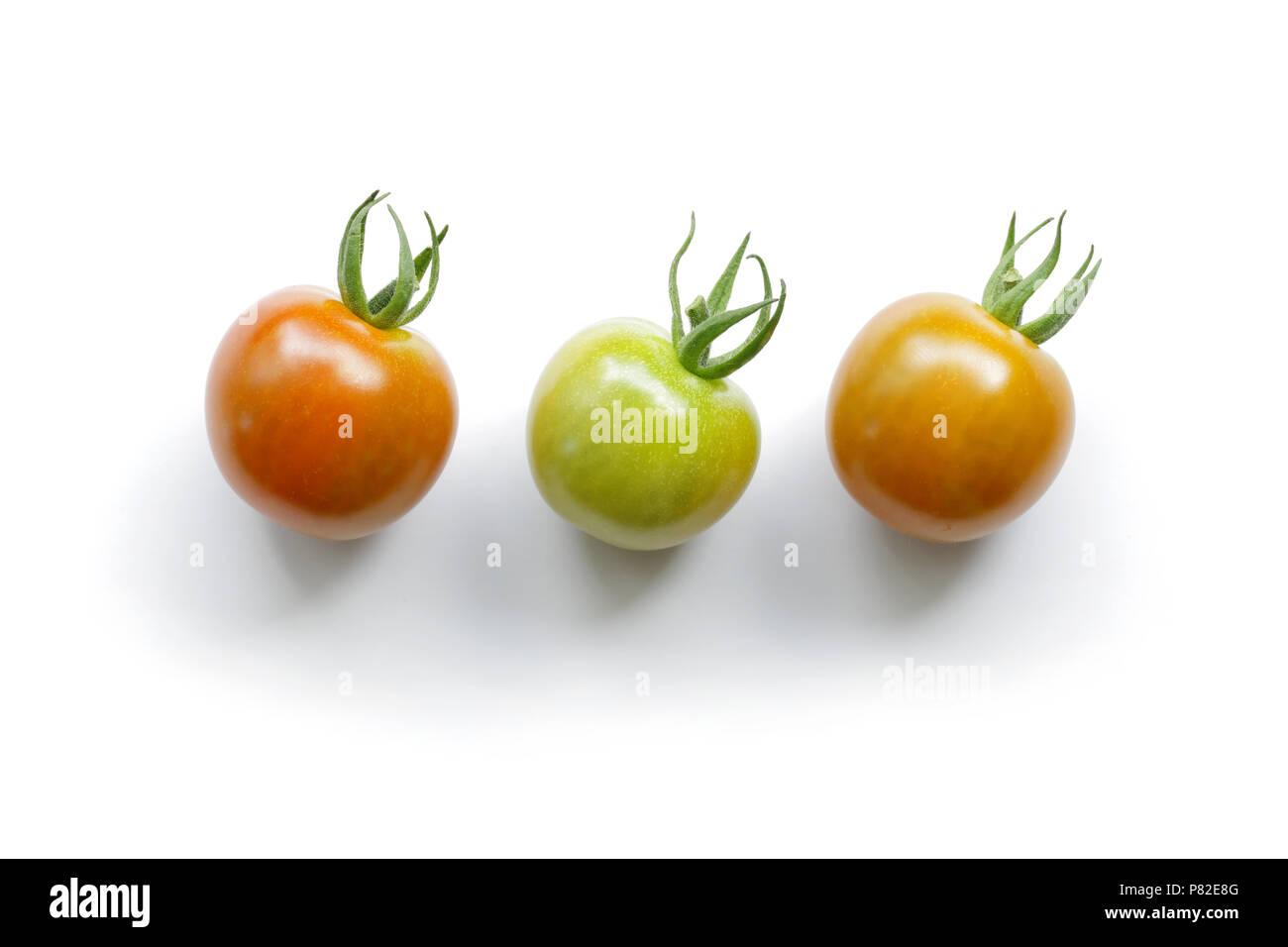 Multi colored cherry tomato isolated on white background Stock Photo ...