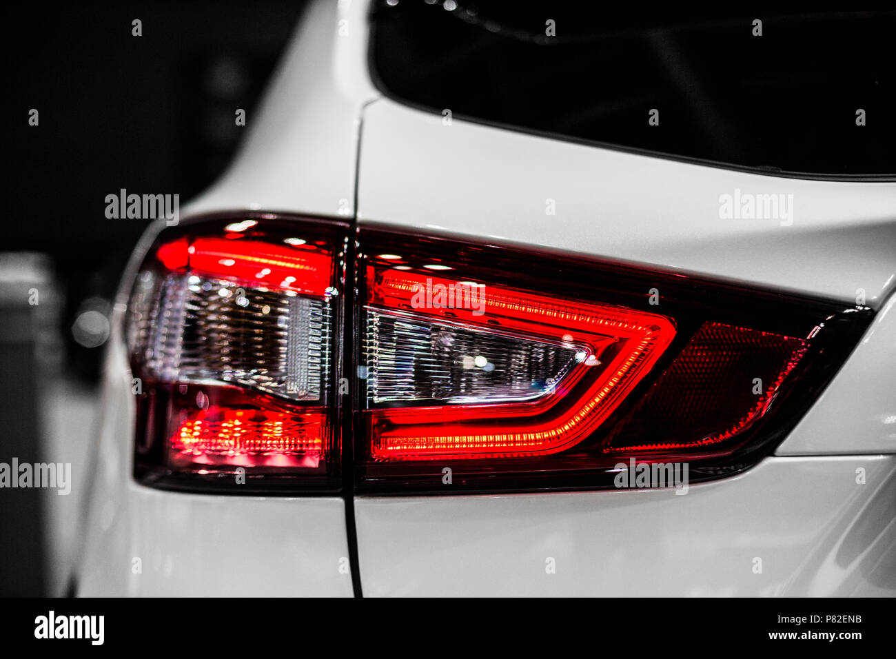 Rear stop light of white modern car Stock Photo - Alamy