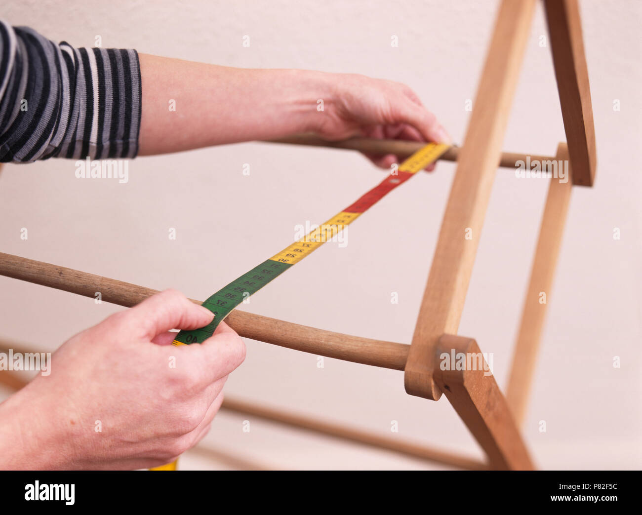 Making a storage unit from a wooden drying frame hi-res stock ...