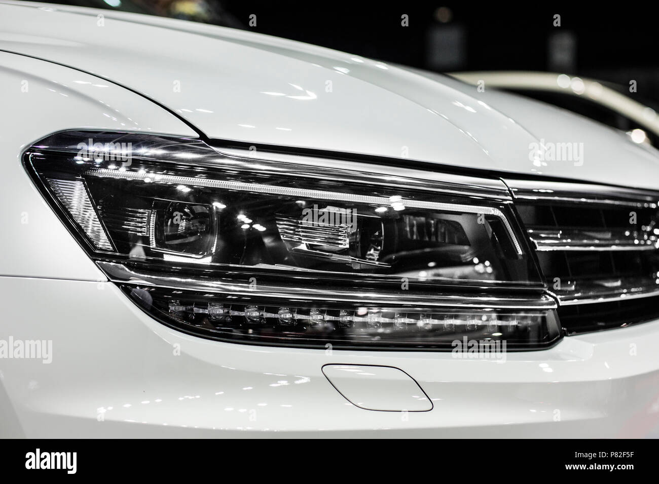 headlight of white modern car with led and xenon optics Stock Photo - Alamy
