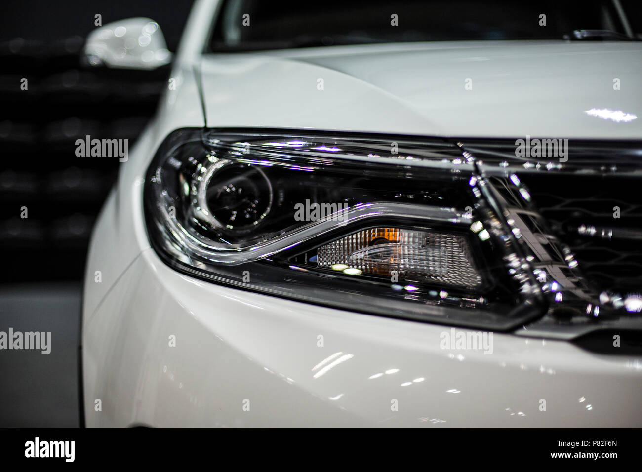 headlight of white modern car with led and xenon optics Stock Photo - Alamy