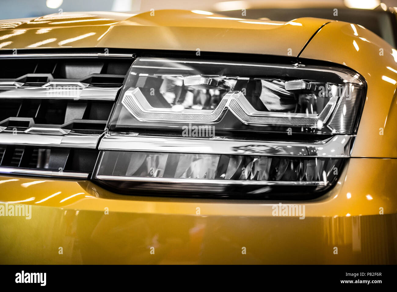 headlight of large SUV modern car with led and xenon optics Stock Photo ...