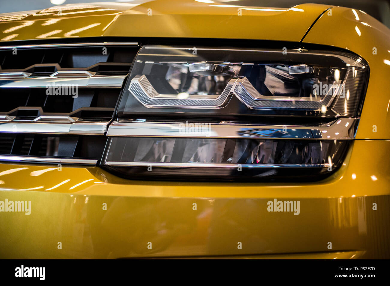 headlight of modern yellow car with led and xenon optics Stock Photo ...
