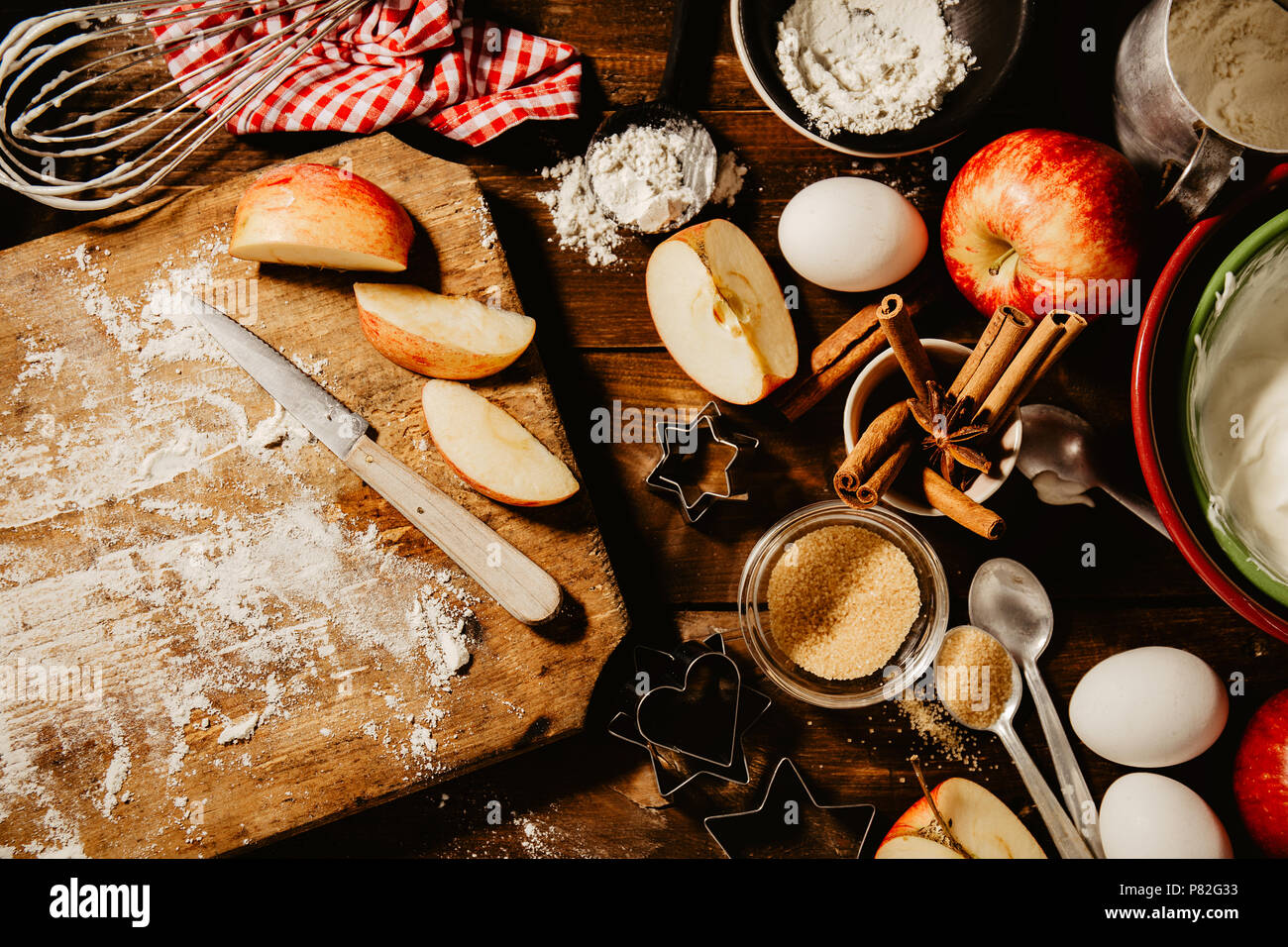 Baking concept of autumn apple pie. View from above on kitchen table ...