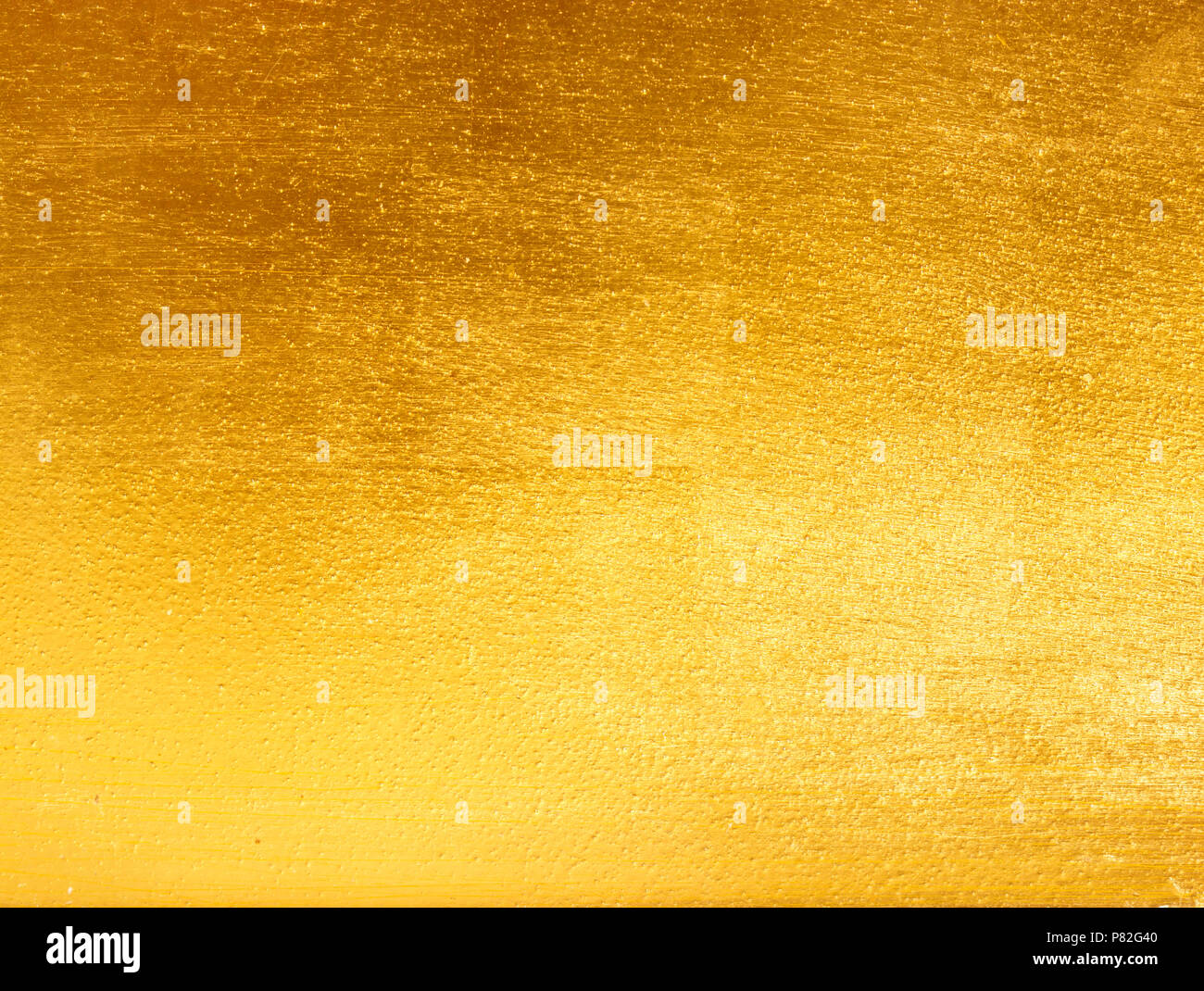 Gold background texture Sheet metal, gold highlights Stock Photo - Alamy