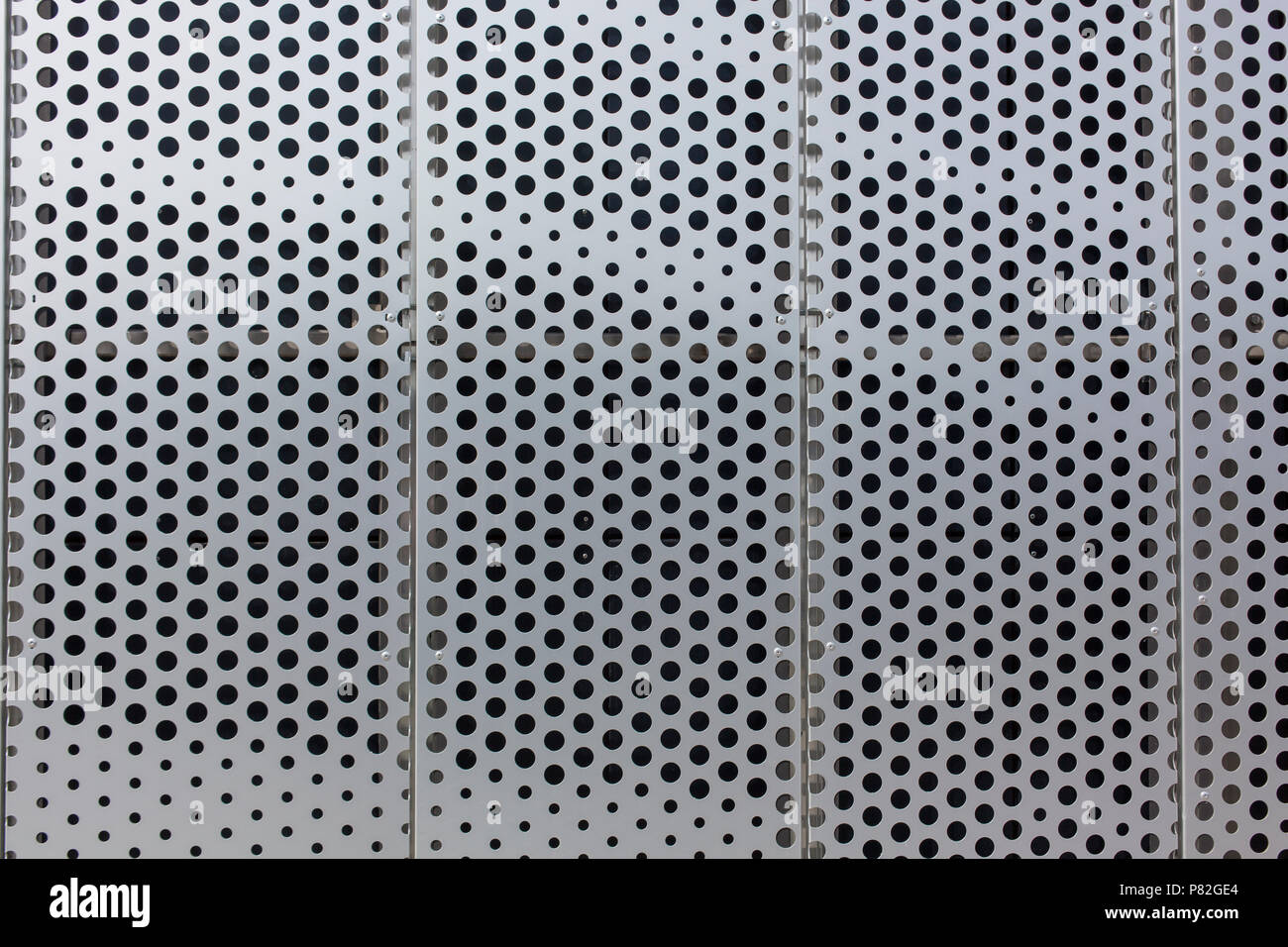dots on a metal surface pattern texture background Stock Photo - Alamy