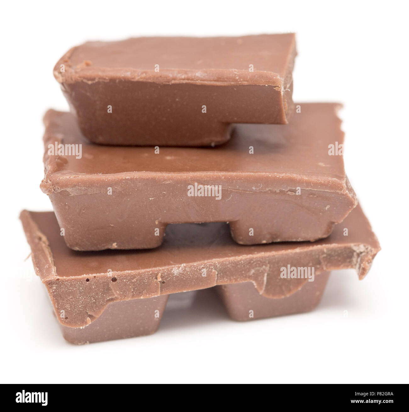 Broken chocolate isolated on white background Stock Photo - Alamy