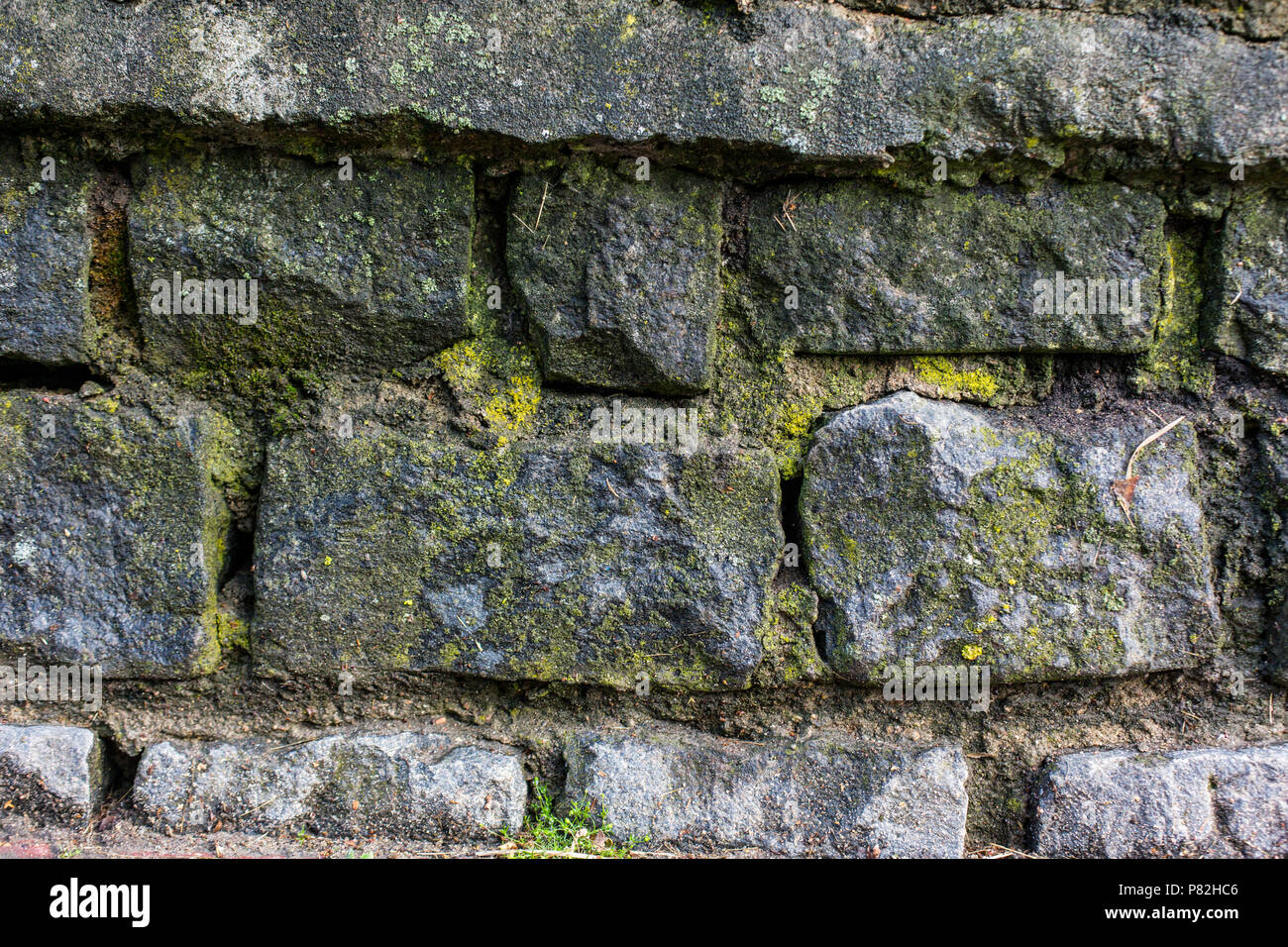 stones with moss pattern texture background Stock Photo - Alamy