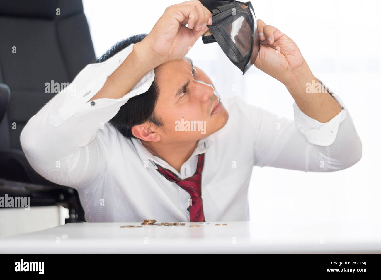 Sad man empty wallet hi-res stock photography and images - Alamy