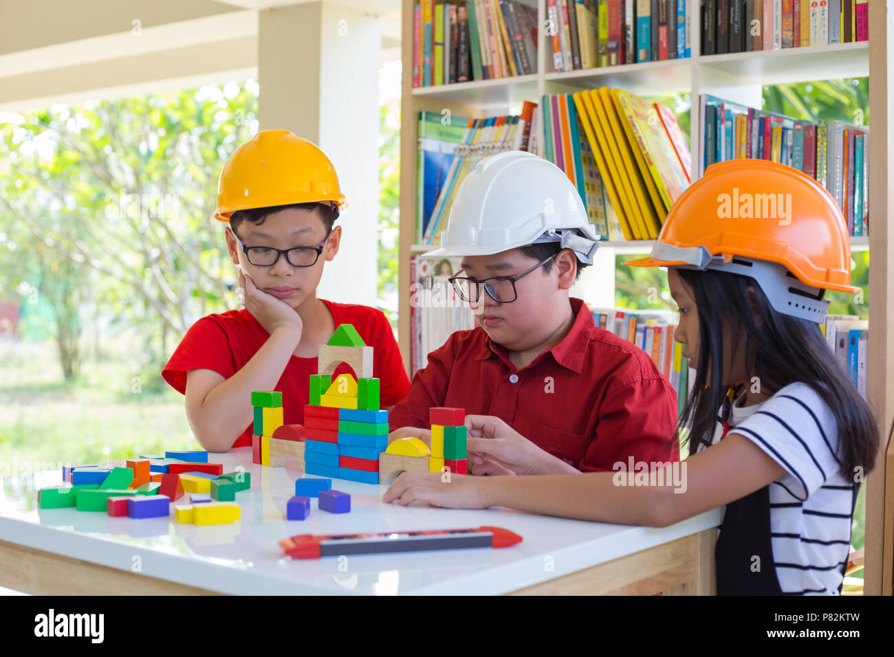Asian kids playing indoor hi-res stock photography and images - Alamy