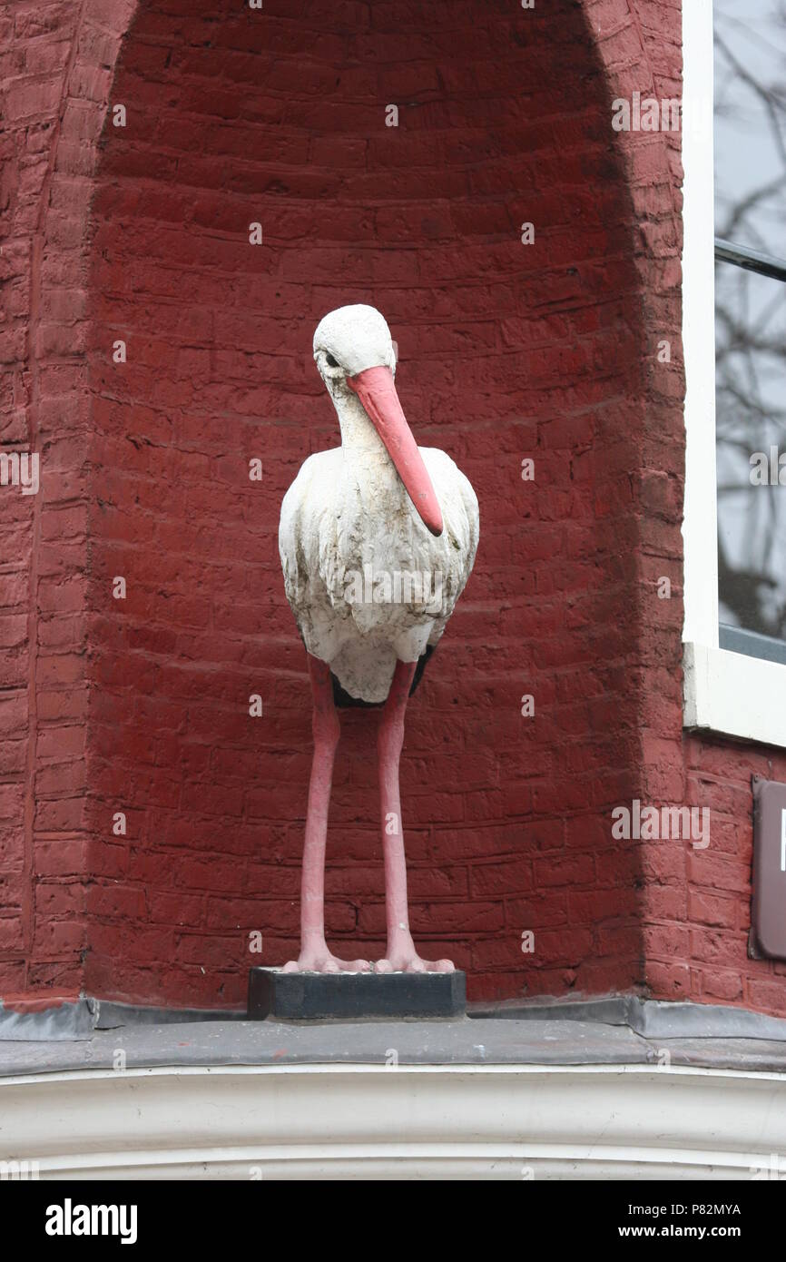Statue of White Stork in Amsterdam; Gevelbeeld Ooievaar in Amsterdam ...