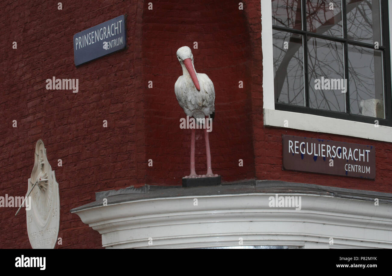 Statue of White Stork in Amsterdam; Gevelbeeld Ooievaar in Amsterdam ...
