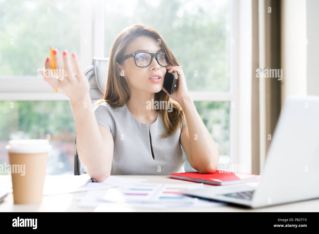 Female boss busy office hi-res stock photography and images - Alamy