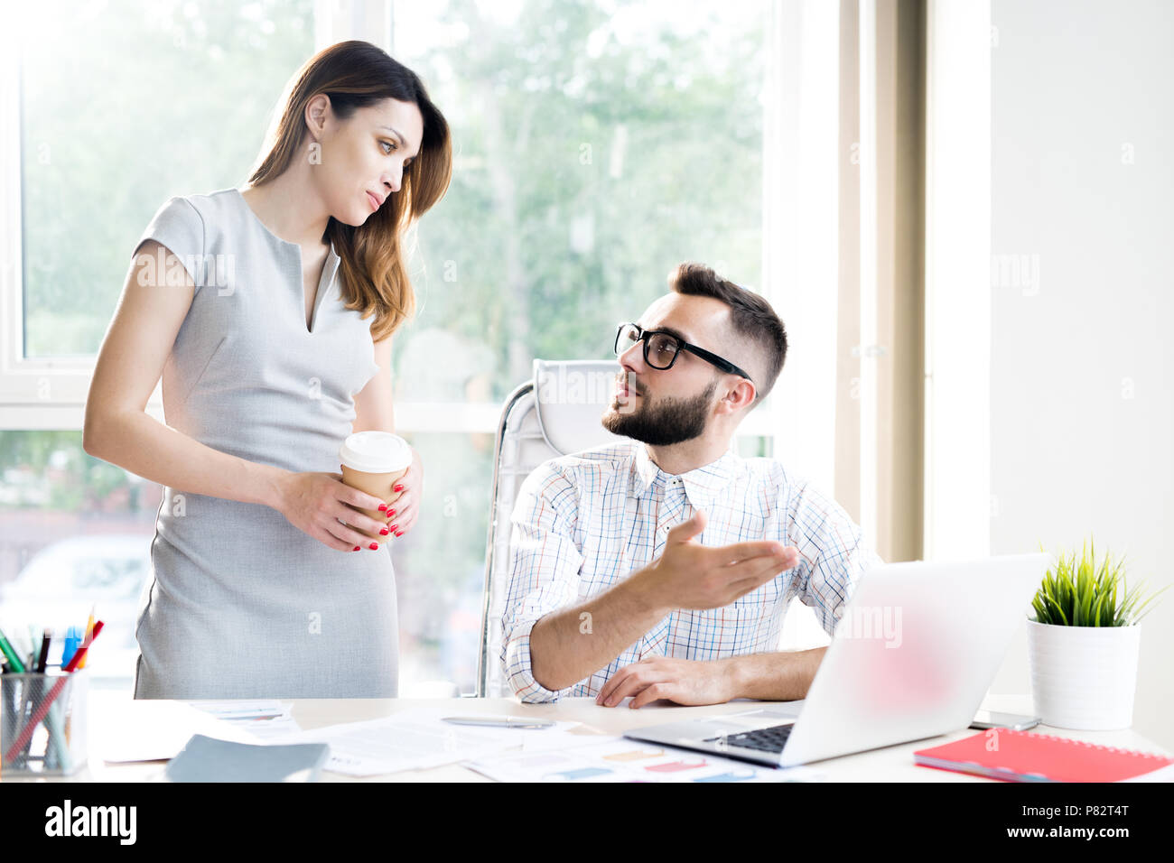 Two Business Managers Discussing Work Stock Photo - Alamy