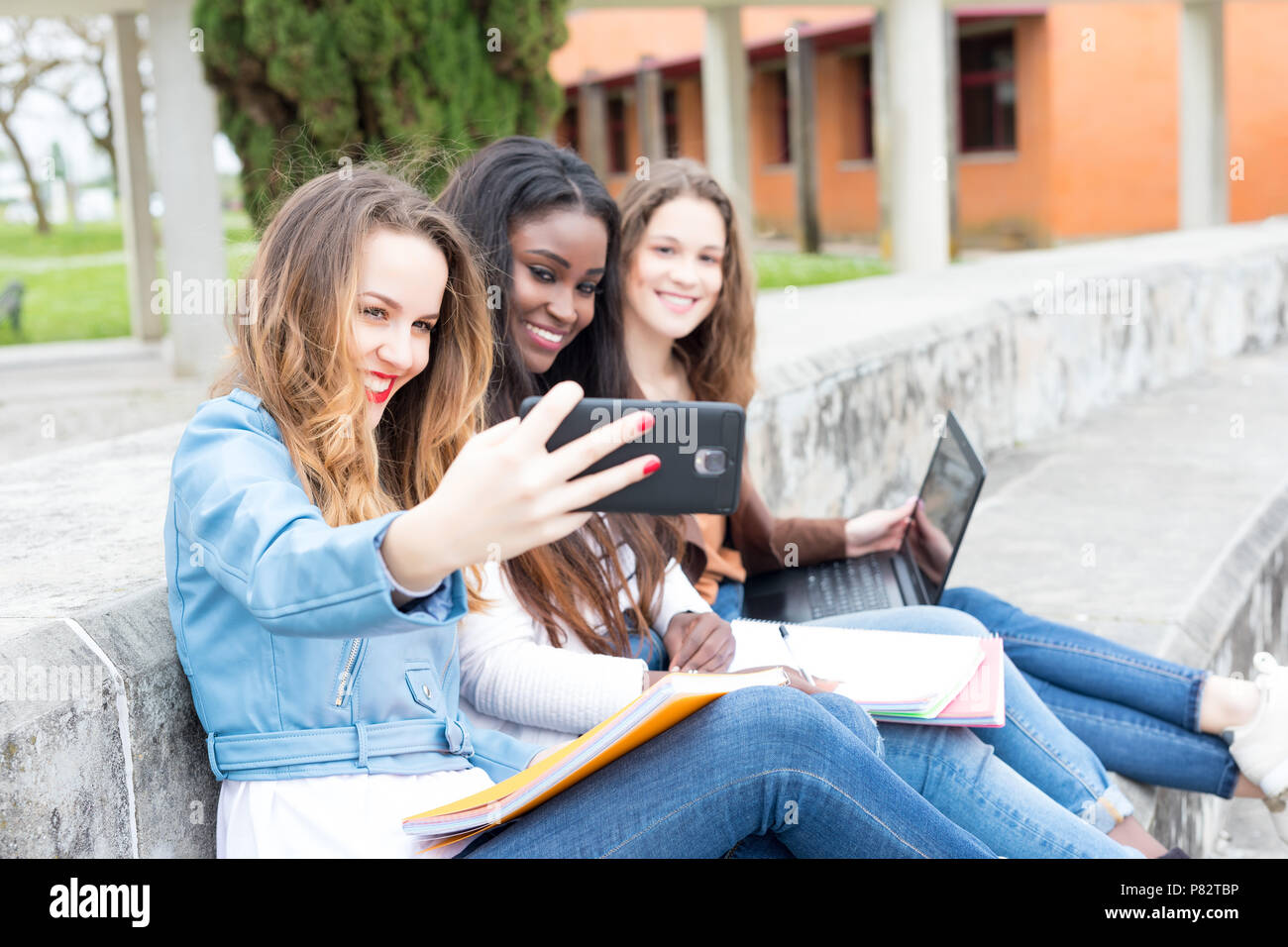 Group multi ethnic young students at the university campus Stock Photo ...