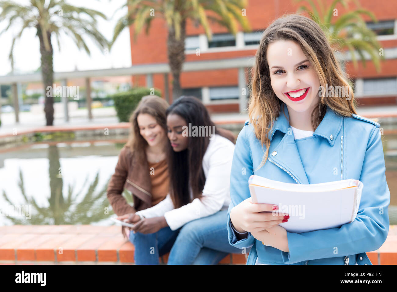 Group multi ethnic young students at the university campus Stock Photo ...