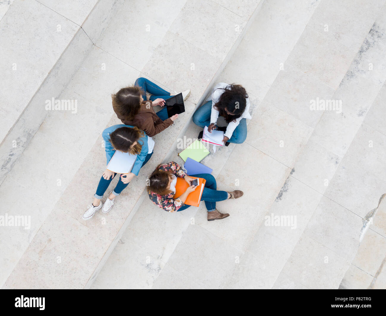 Drone Shot : Group multi ethnic young students at the university campus ...