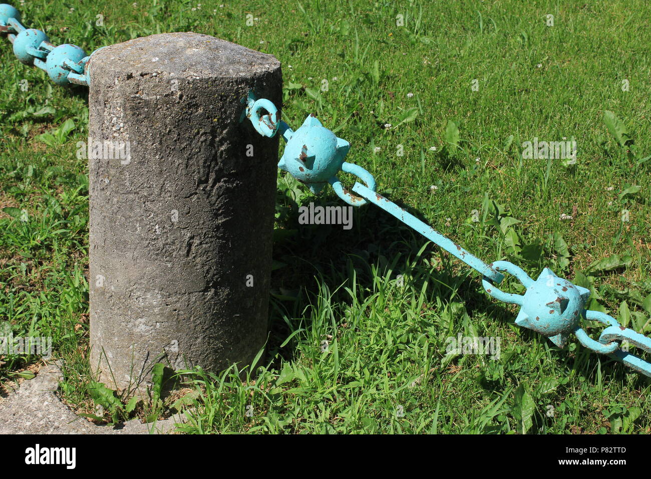 Decorative copper and heavy ball and chain boundary designation at the ...
