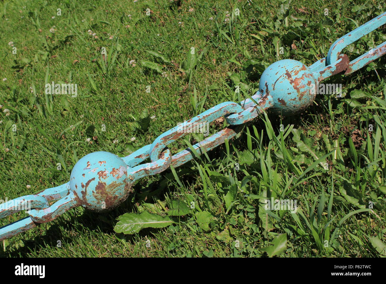 Decorative copper and heavy ball and chain boundary designation at the ...