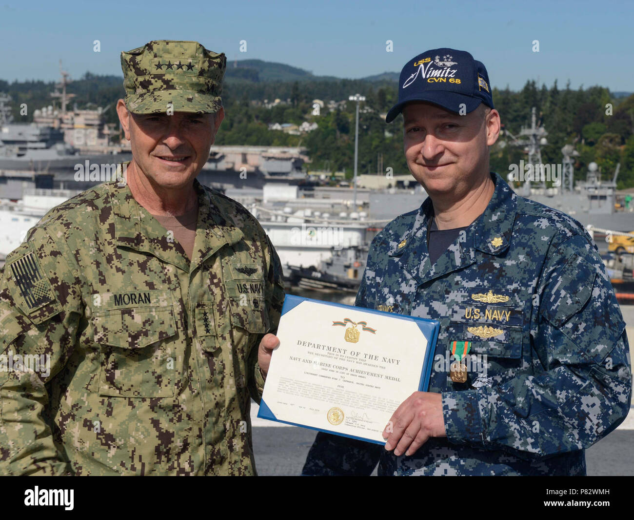 NAVAL BASE KITSAP-BREMERTON, Wash. (July 25, 2016) – Lt. Cmdr. Evan J ...