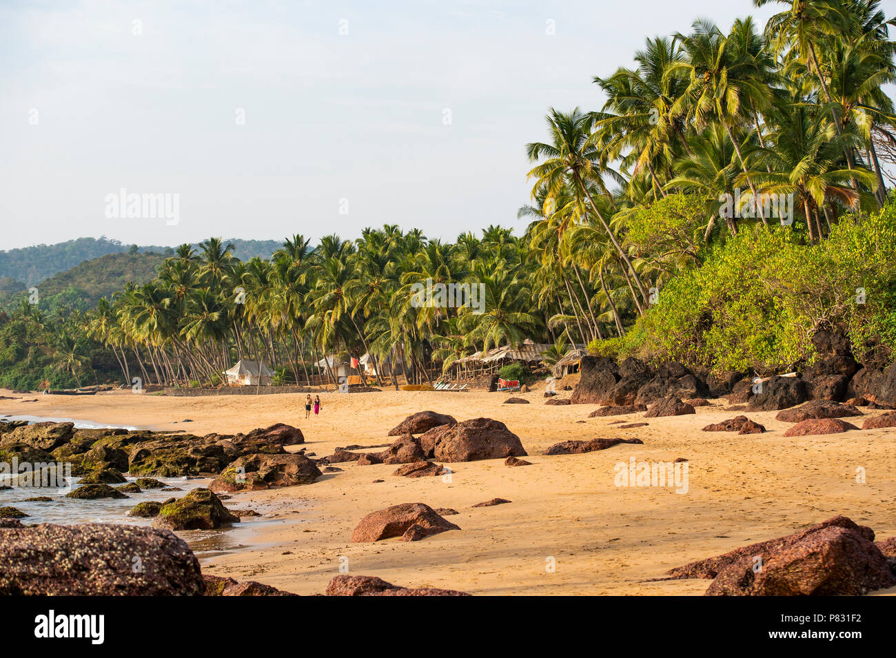 VARKALA - INDIA - 16 FEBRUARY 2018. A couple is walking on a beautiful ...