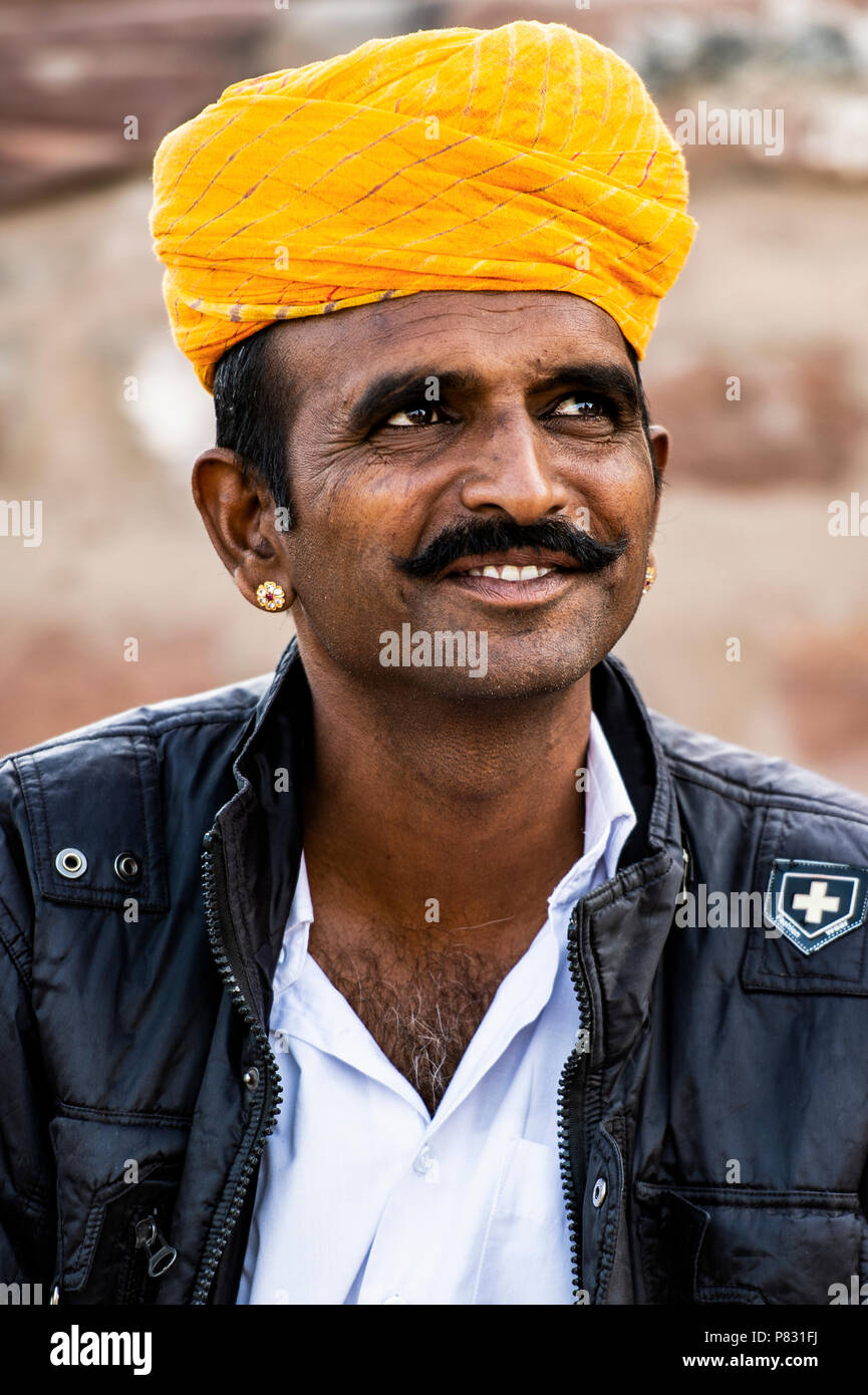 Rajasthani with moustache and yellow turban hi-res stock photography ...