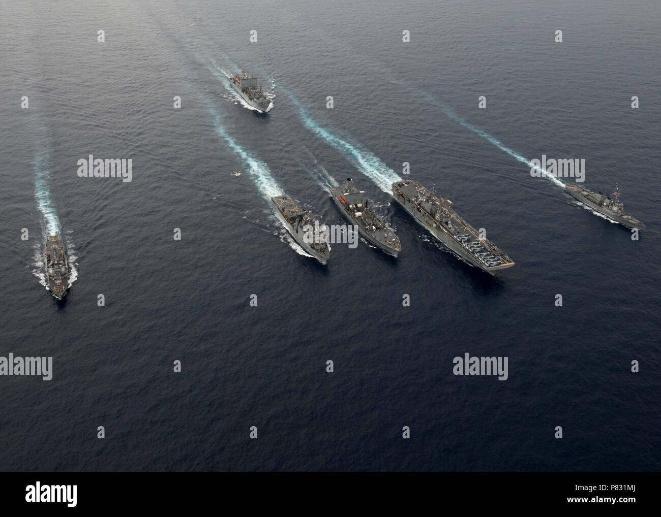 China Sea (Oct. 13, 2016) Clockwise from left, the guided-missile ...