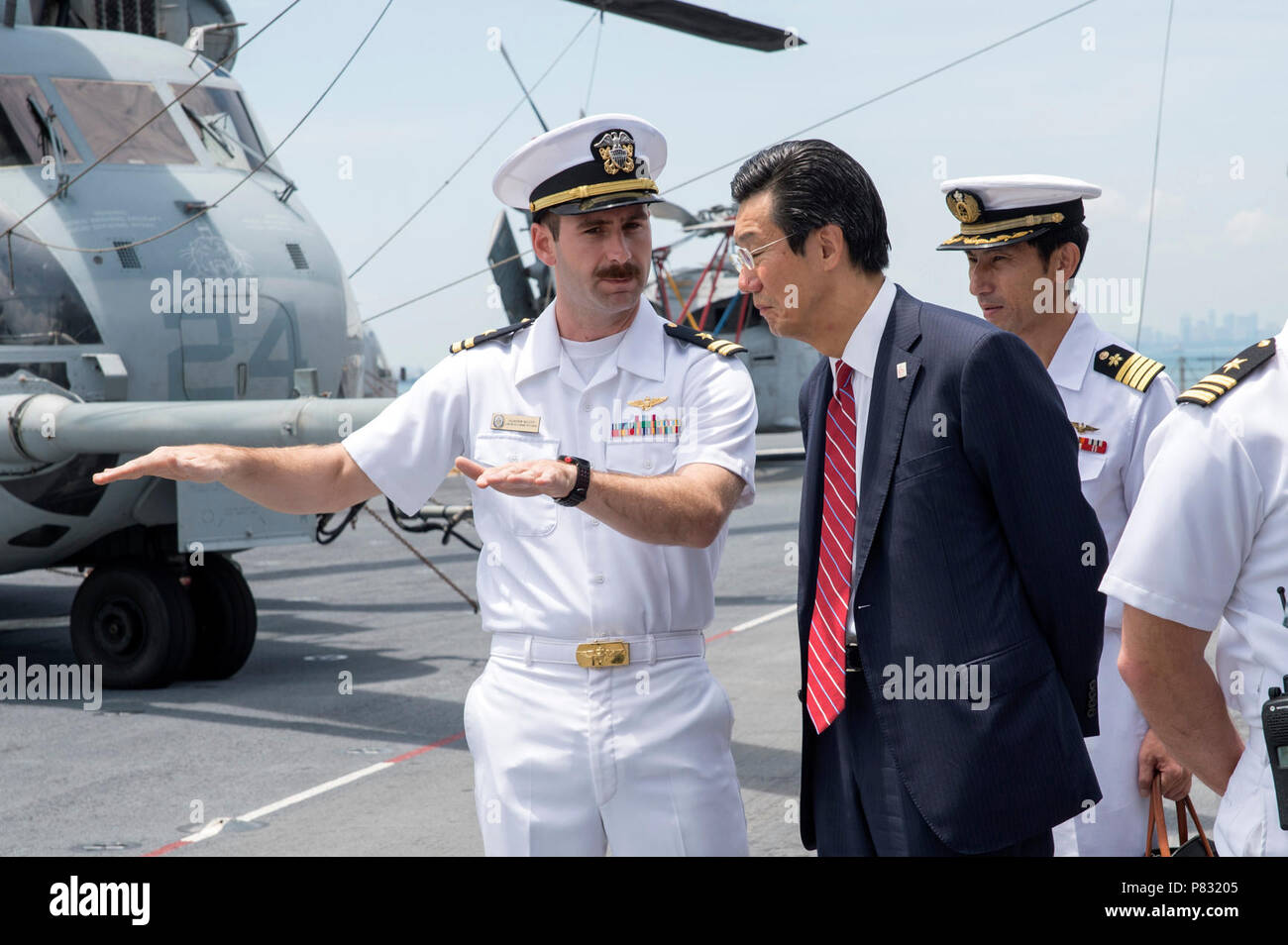 SINGAPORE (Oct. 18, 2016) Lt. Hunter Scott discusses flight deck ...