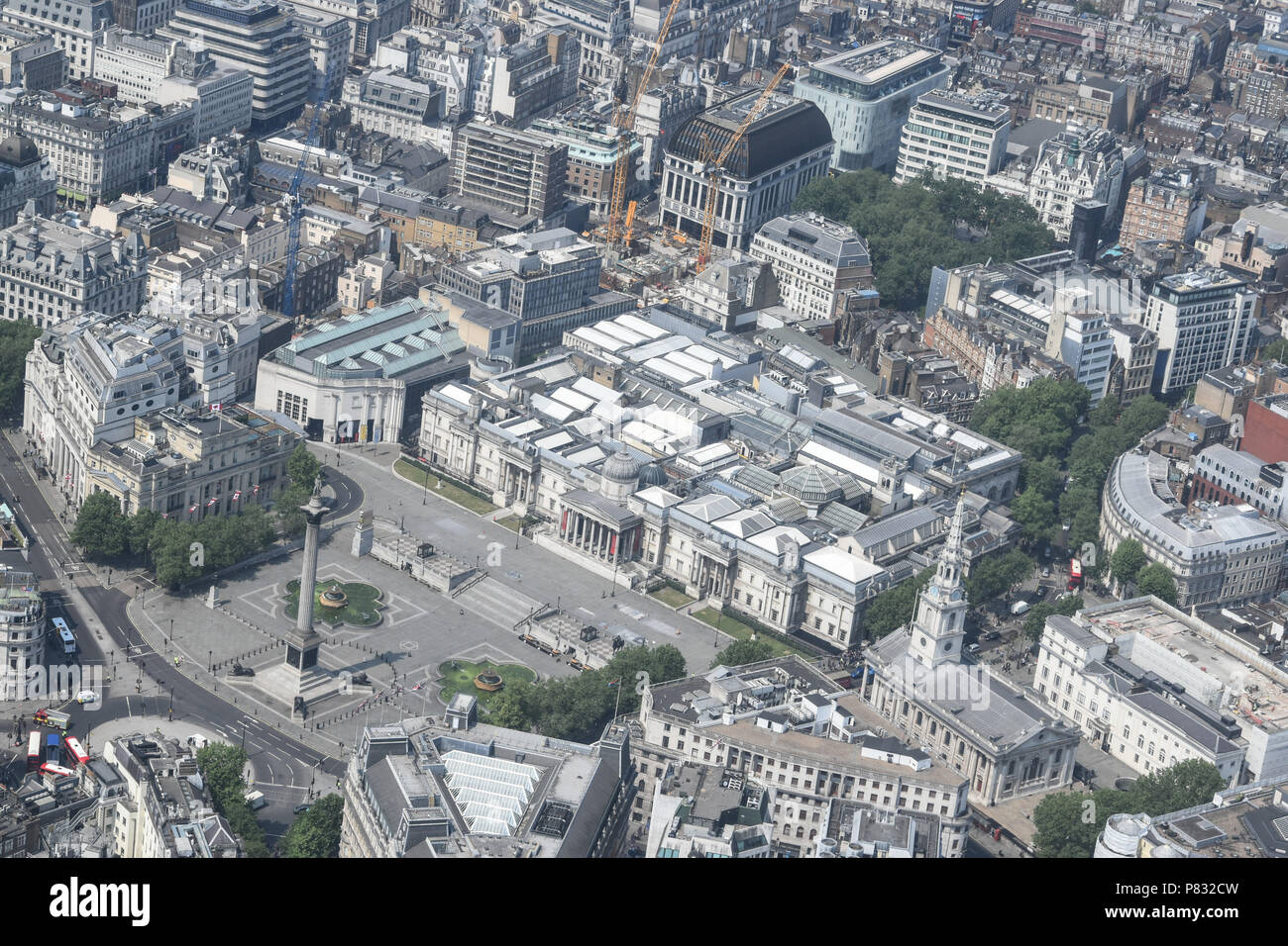 Trafalgar Square, London seen from above in a helicopter featuring ...