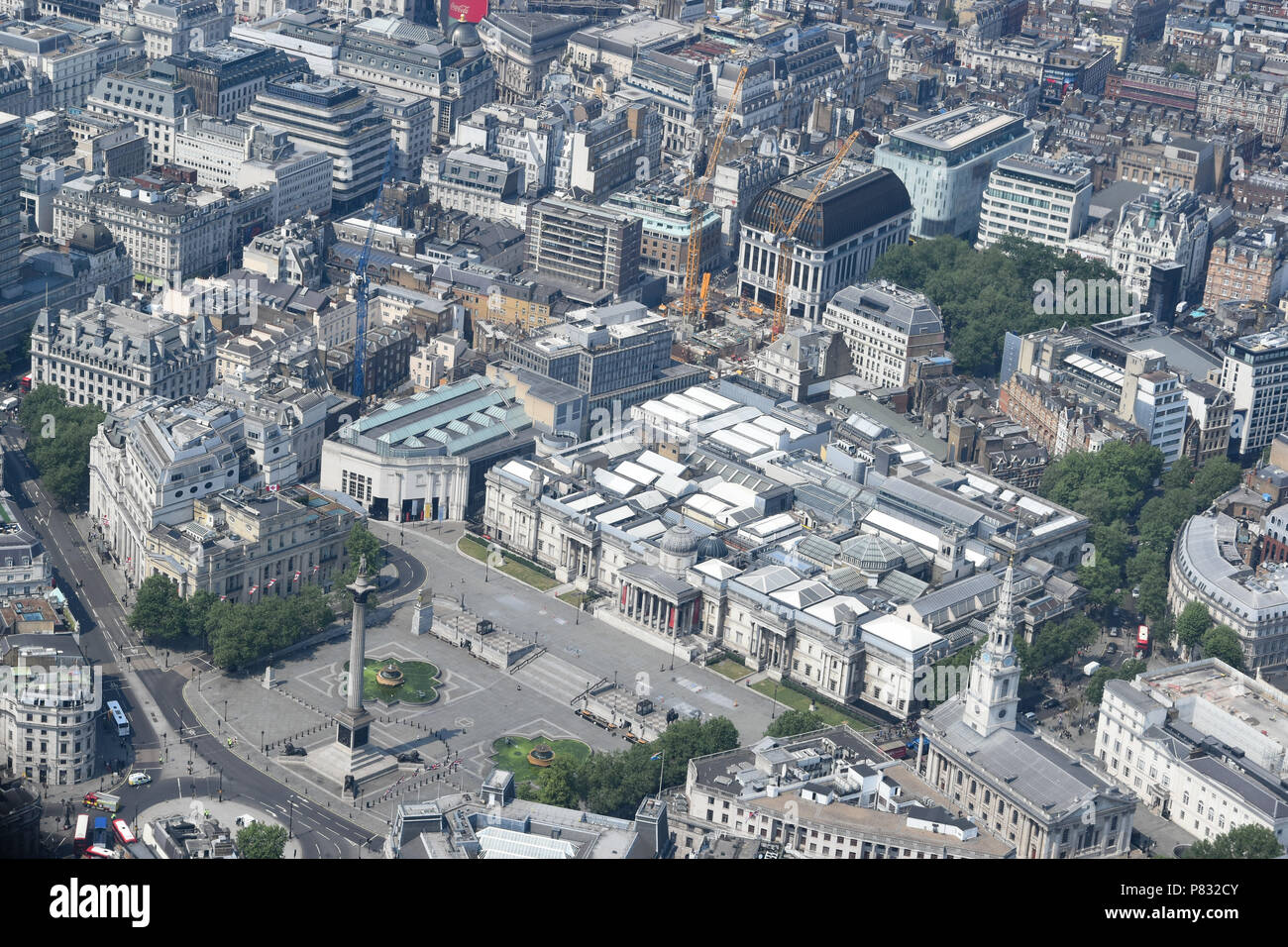 Trafalgar Square, London seen from above in a helicopter featuring ...