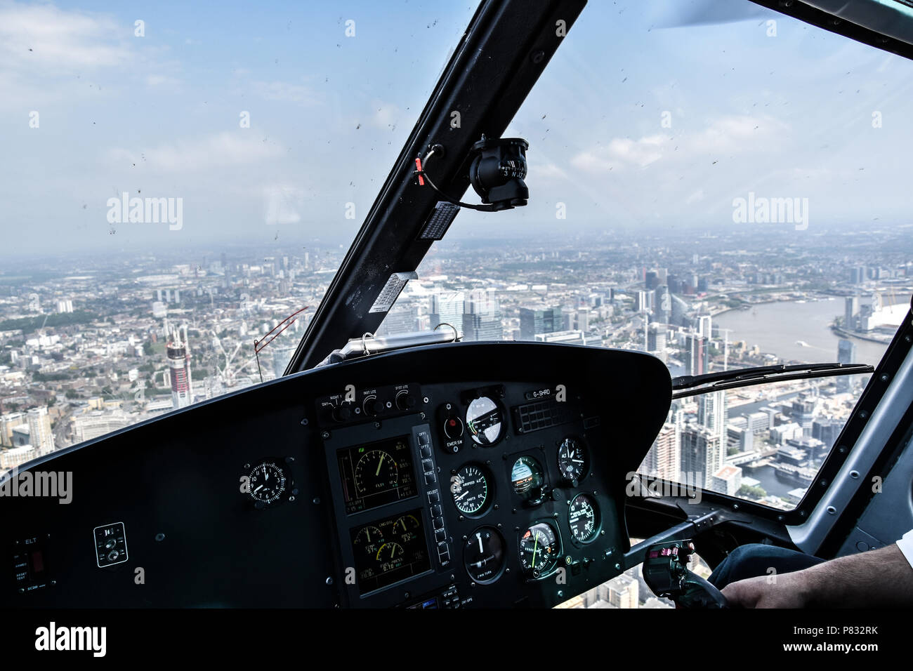 The Canary Wharf skyline as seen from a helicopter, London, United ...