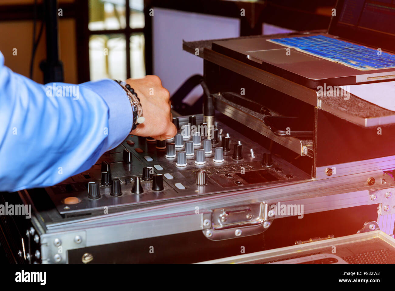 remote and mixer DJ hands for sound music mixer control panel Stock ...