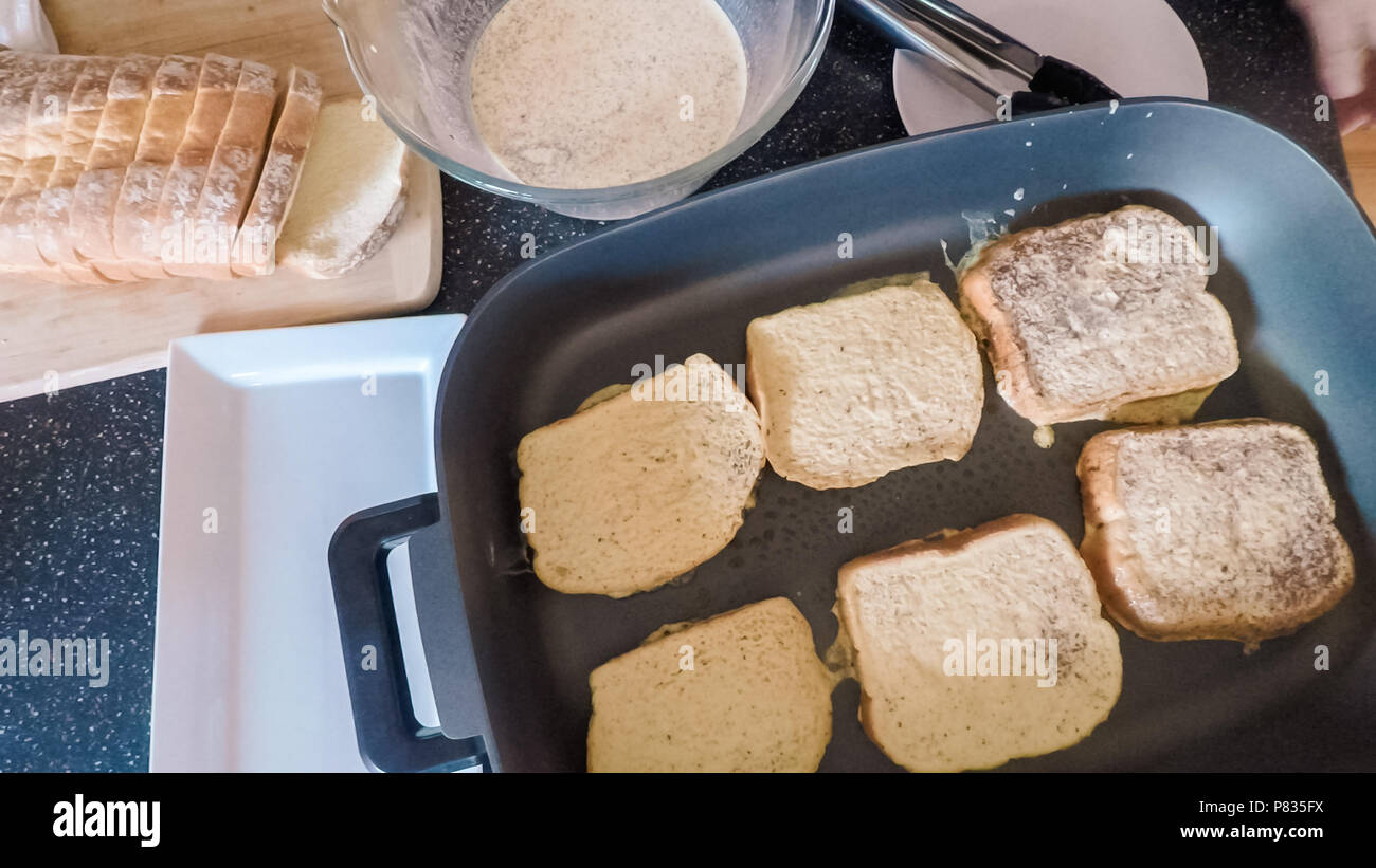 Step by step. Preparing French toast for breakfast Stock Photo - Alamy