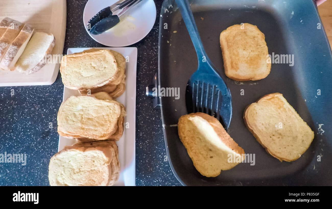 Step by step. Preparing French toast for breakfast Stock Photo - Alamy