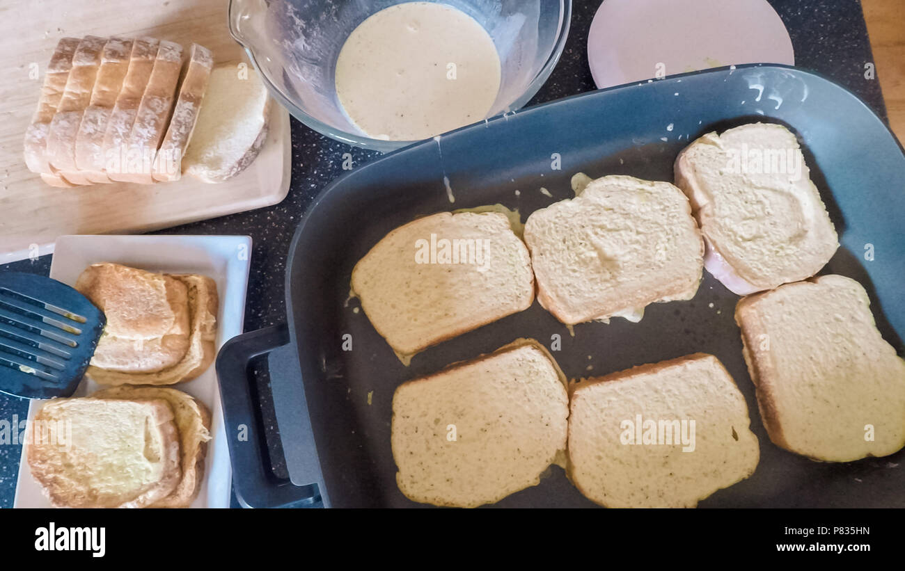 Step by step. Preparing French toast for breakfast Stock Photo - Alamy