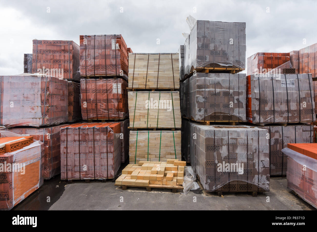 Folded and packed different kinds of bricks Stock Photo - Alamy