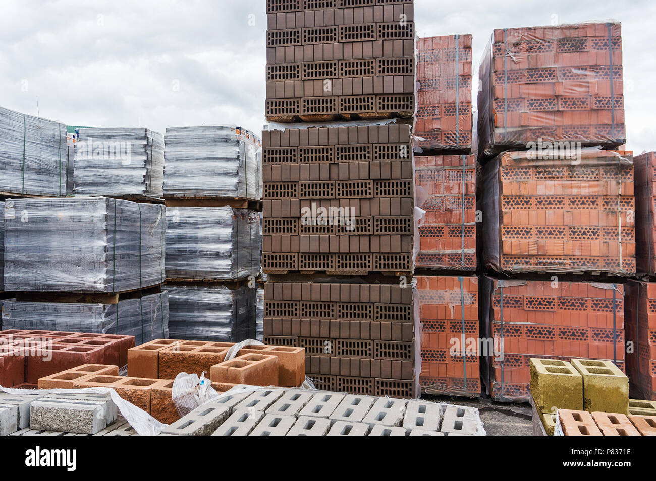 Folded and packed different kinds of bricks Stock Photo - Alamy