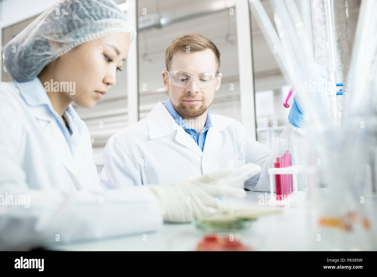 Scientists in Laboratory Stock Photo - Alamy