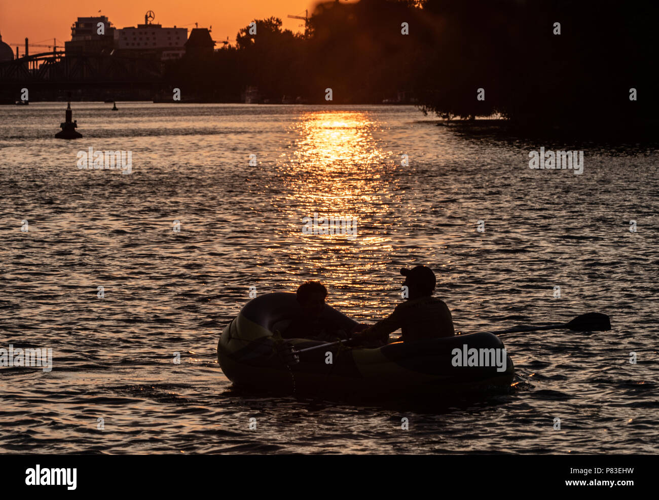 Two people in a dinghy hi-res stock photography and images - Alamy