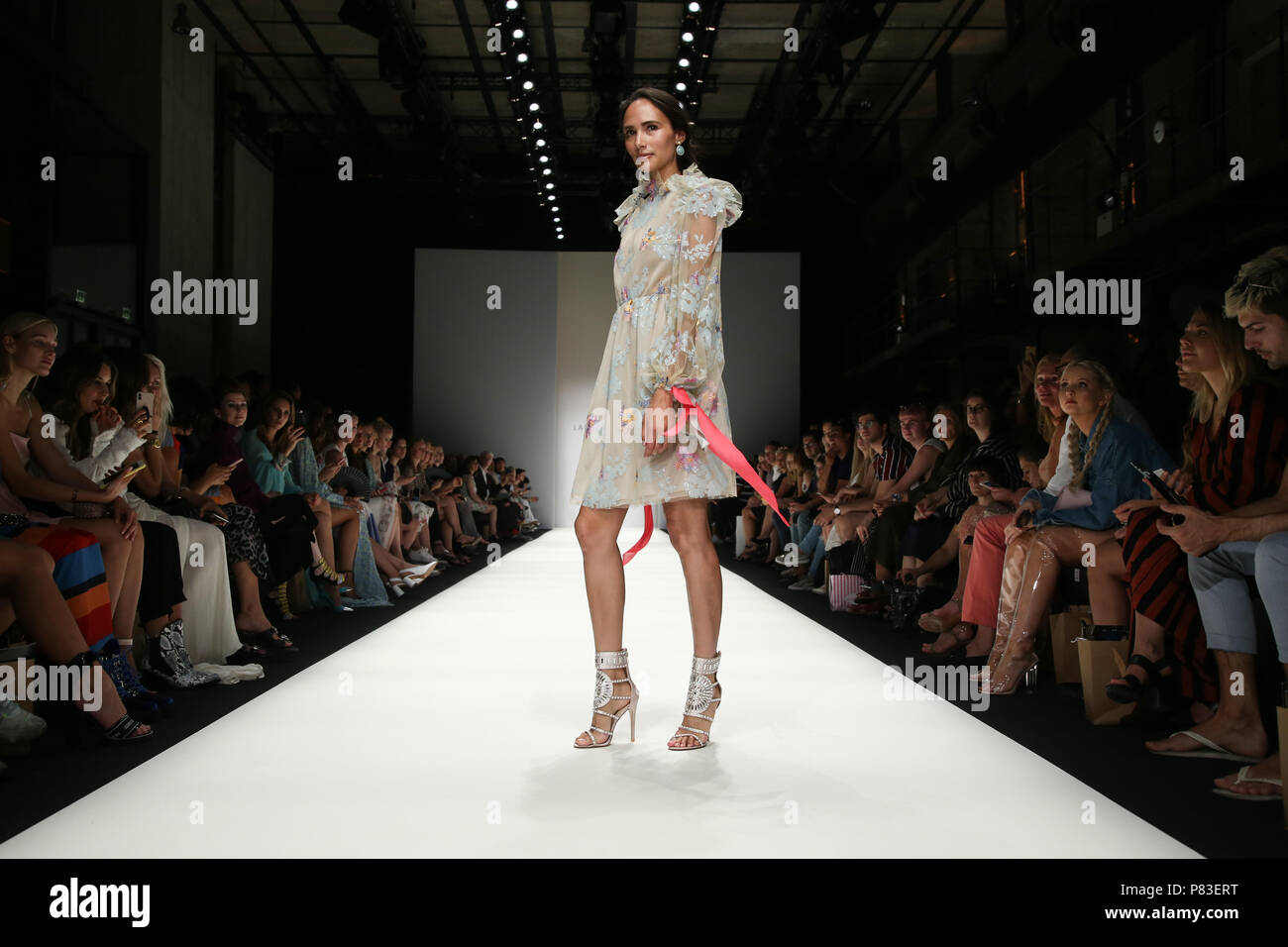 05.07.2018, Berlin: Models show fashion by designer Lana Mueller on the ...