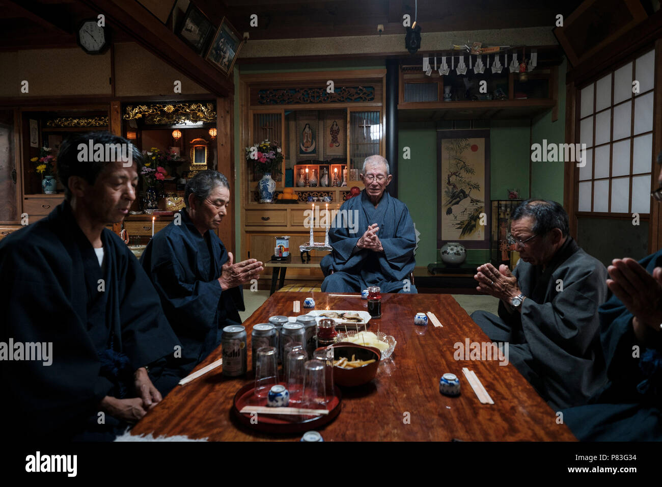 Men from Hidden Christian community sign orasho before communion each ...