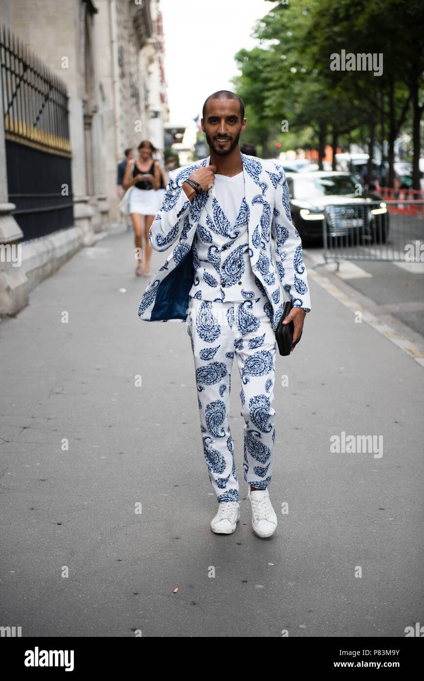Designer Jammad Hamza posing on the street before the Liu Chao runway ...